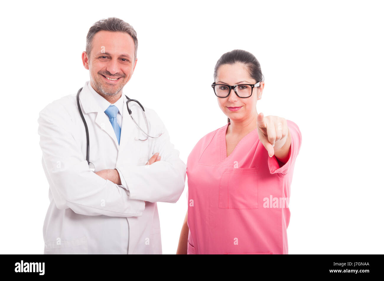 Beautiful female nurse near doctor with stethoscope pointing at you ...