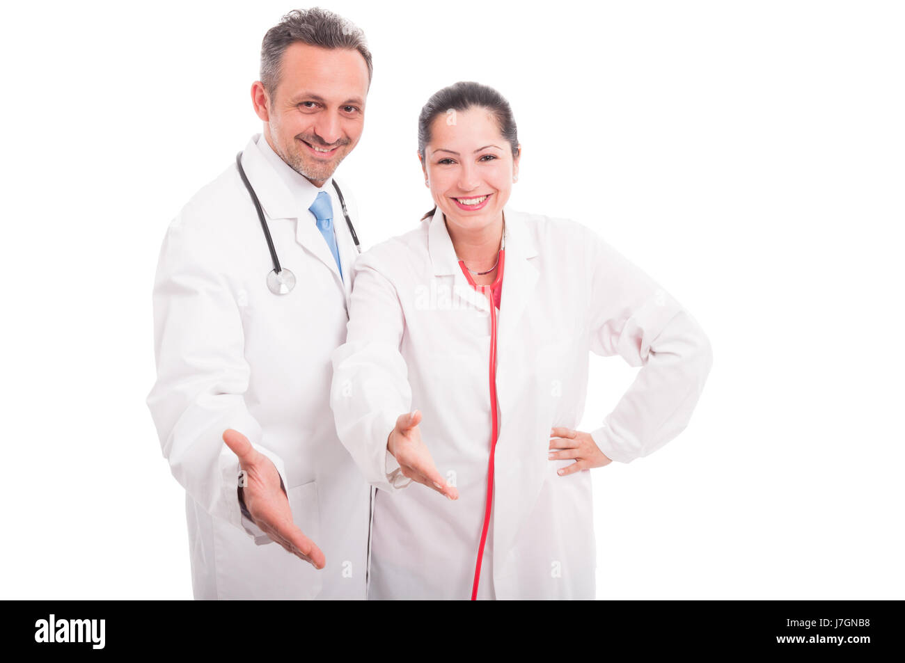 Happy and successful medical team doing handshake gesture as welcoming ...