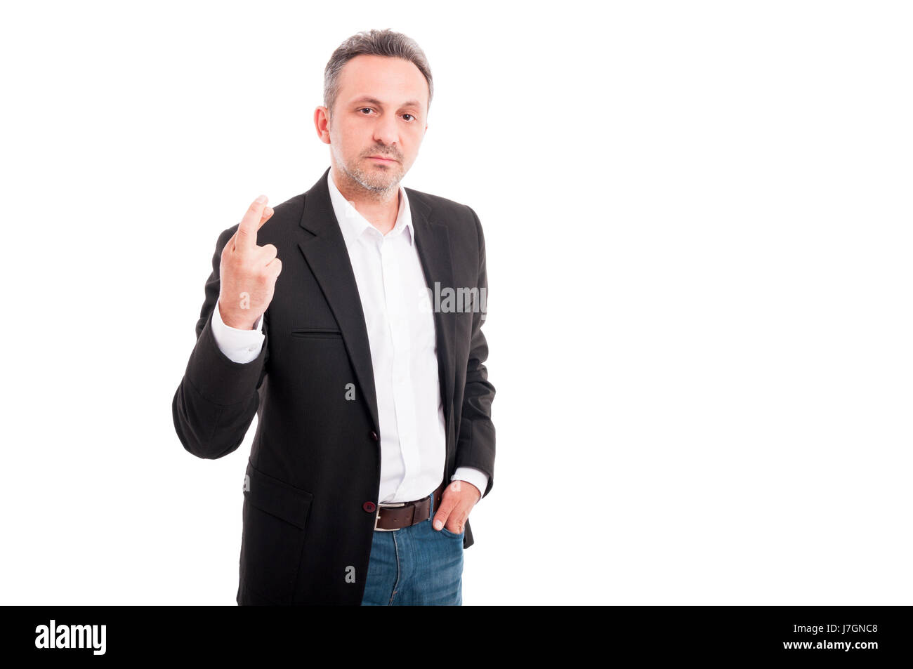 Serious businessman holding his finger crossed as sign of bad luck on ...