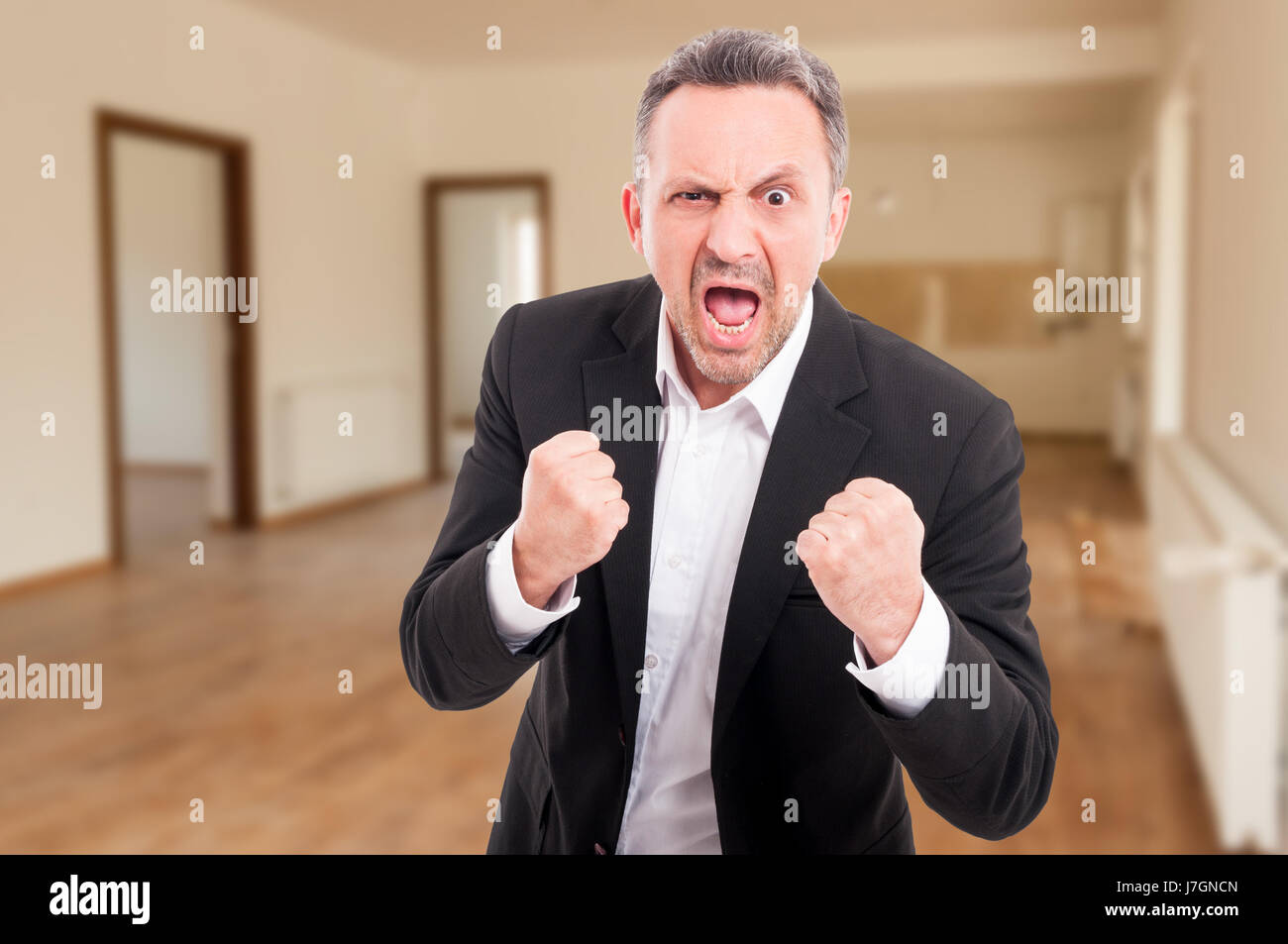 Angry young real estate agent hi-res stock photography and images - Alamy