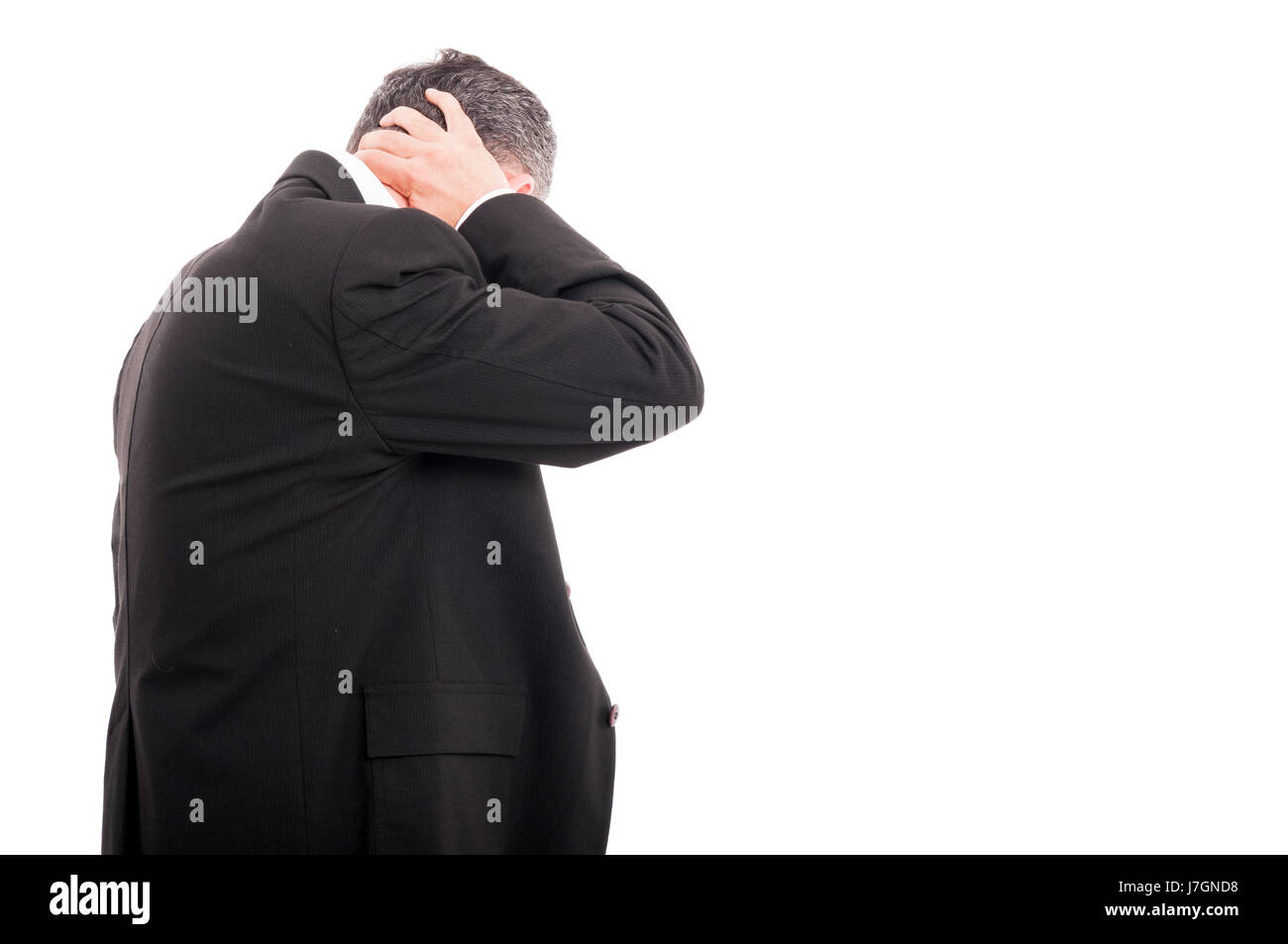 Businessman with headache in back view looking stressed and exhausted ...