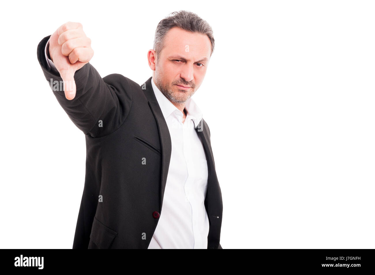 Handsome man showing thumbs down sign or dislike on white background ...