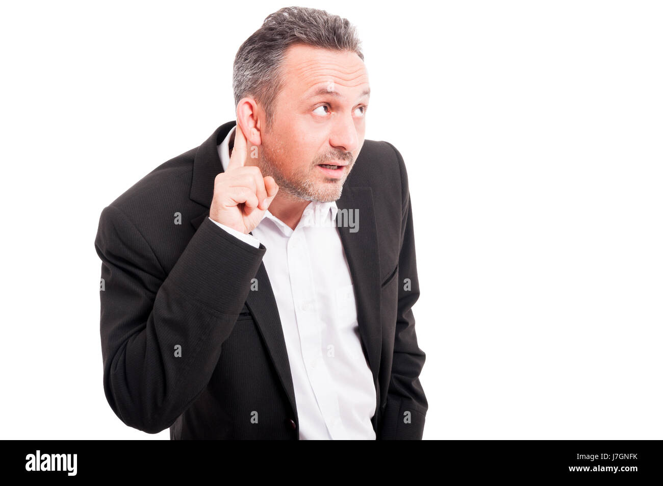 Young entrepreneur secretly listening on private conversation looking ...