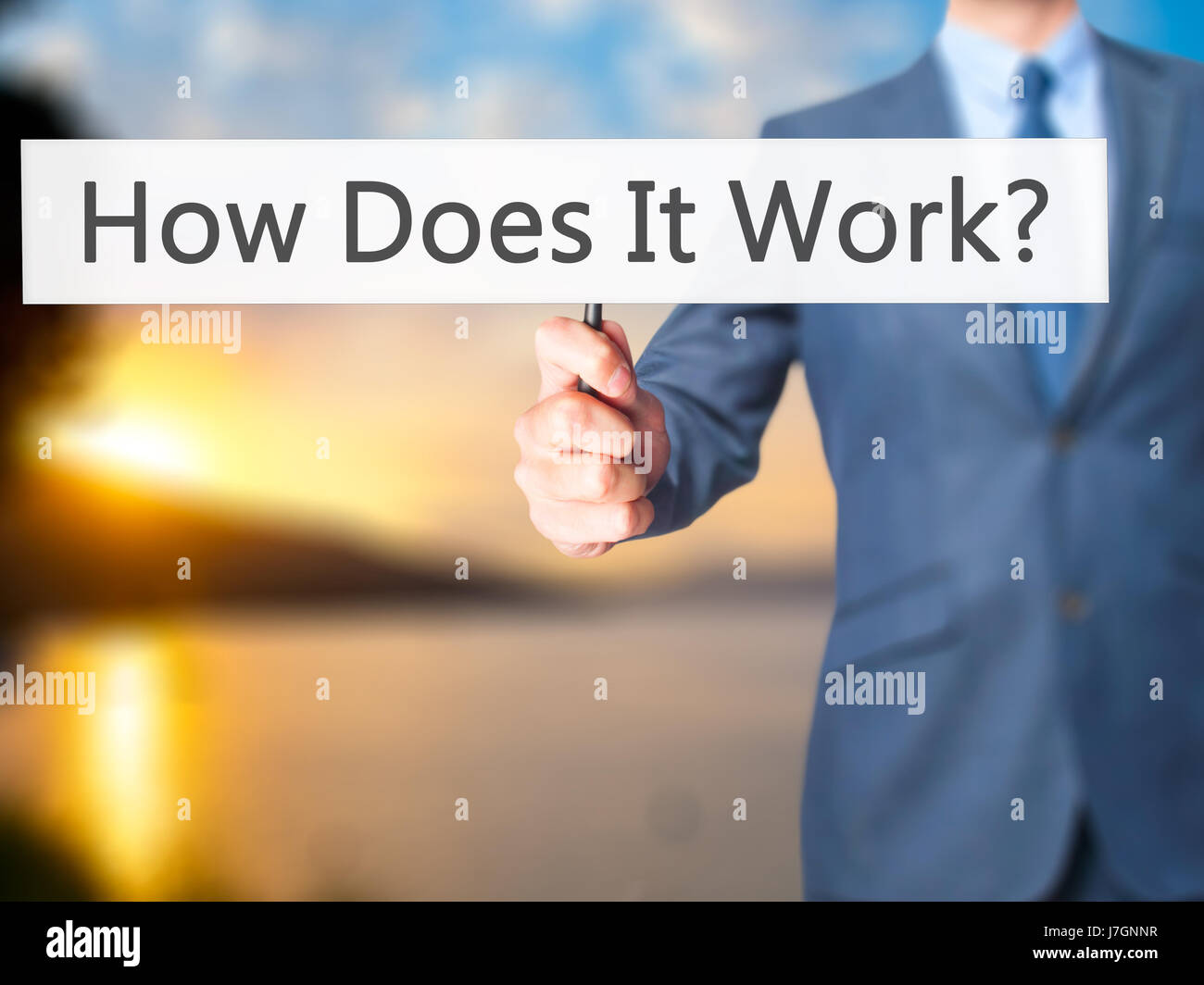 How Does It Work - Businessman hand holding sign. Business, technology ...