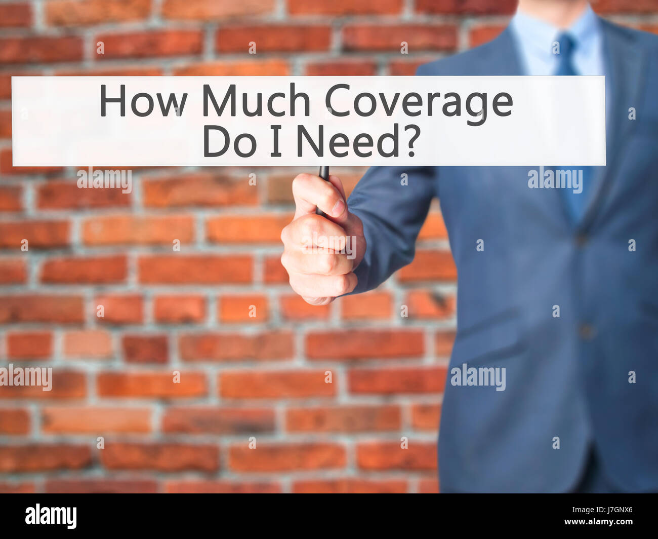 How Much Coverage Do I Need - Businessman hand holding sign. Business ...