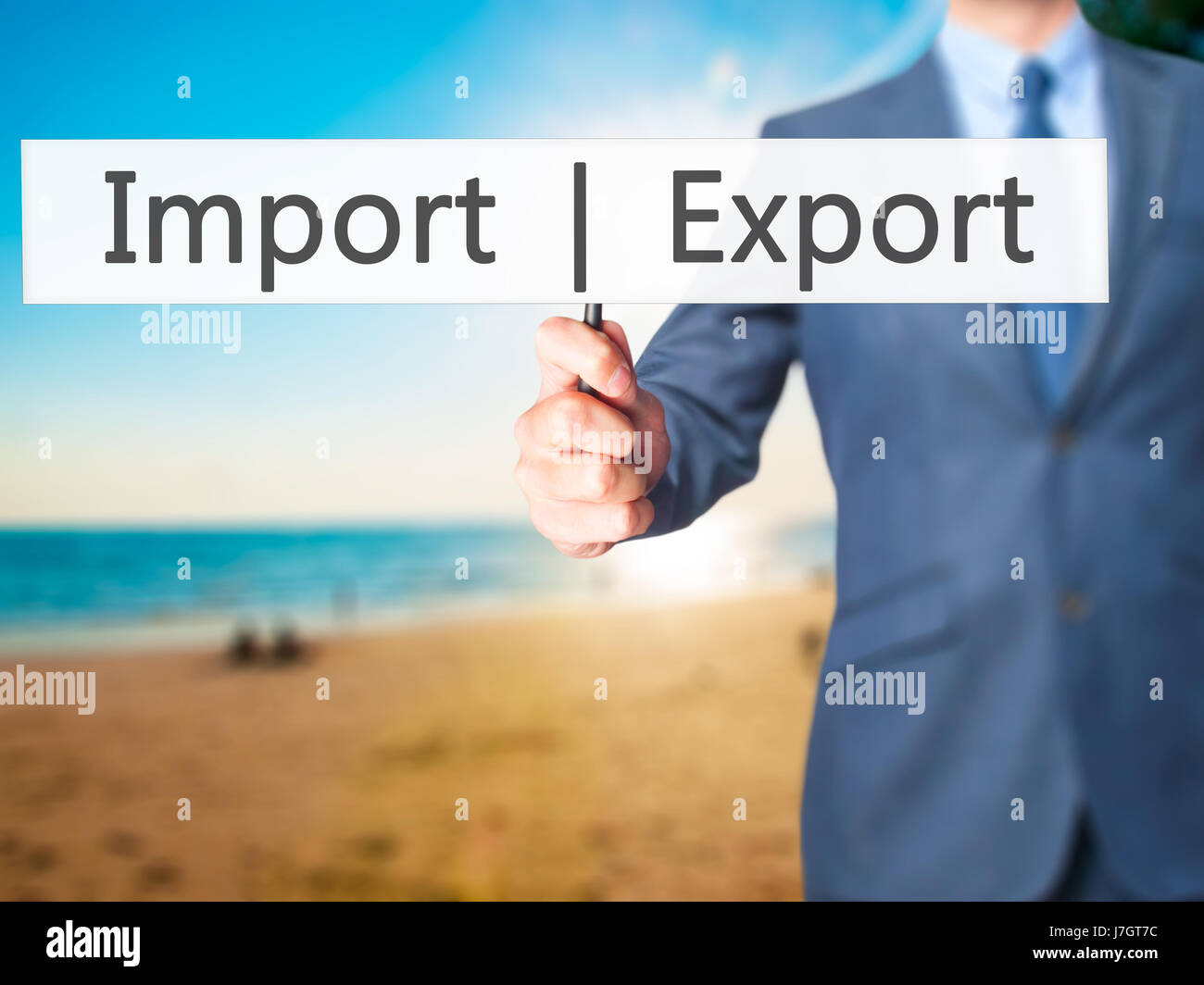 Import Export - Businessman hand holding sign. Business, technology ...