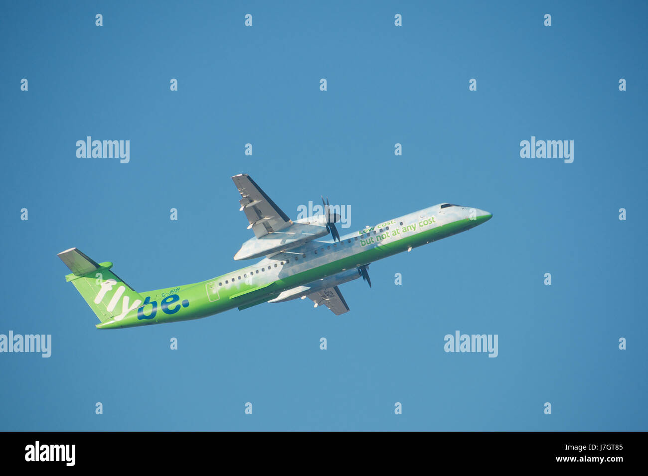 Flybe Bombardier Dash 8 Q400 aircraft against a blue sky Stock Photo ...