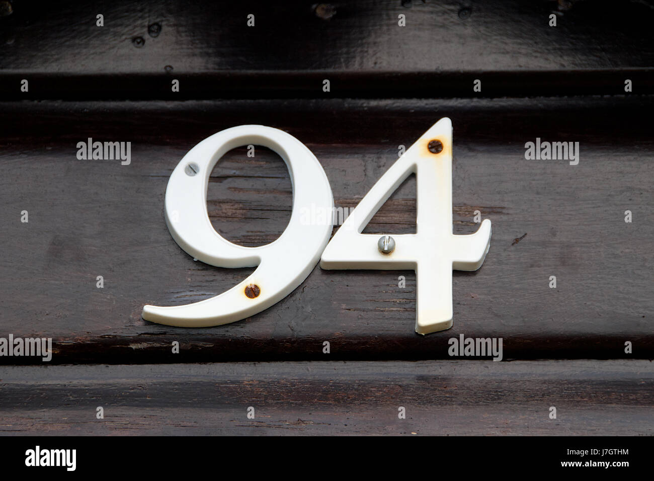 The number 94 on a beach hut Stock Photo - Alamy
