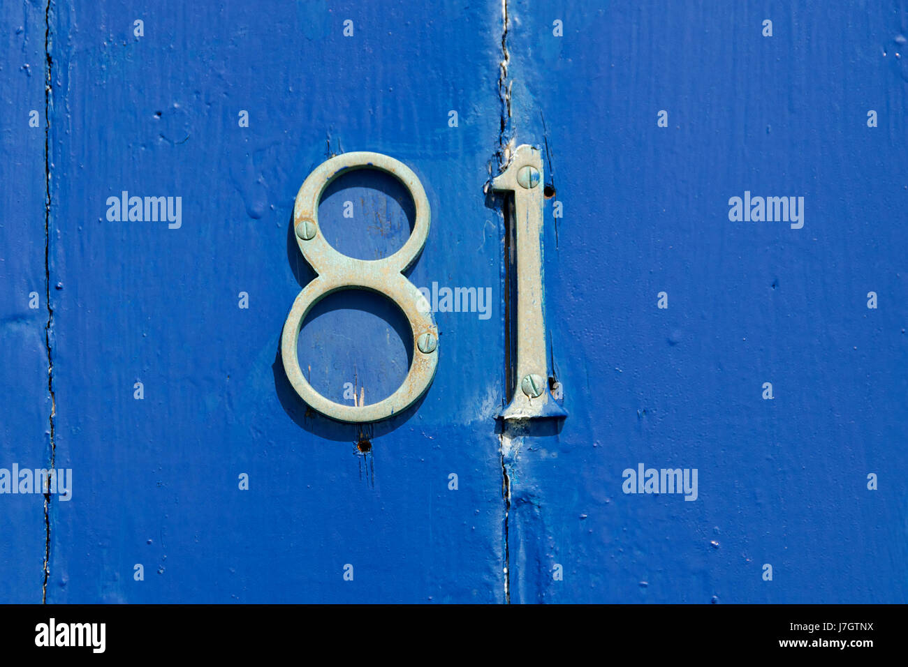 The number 81 on a beach hut Stock Photo - Alamy
