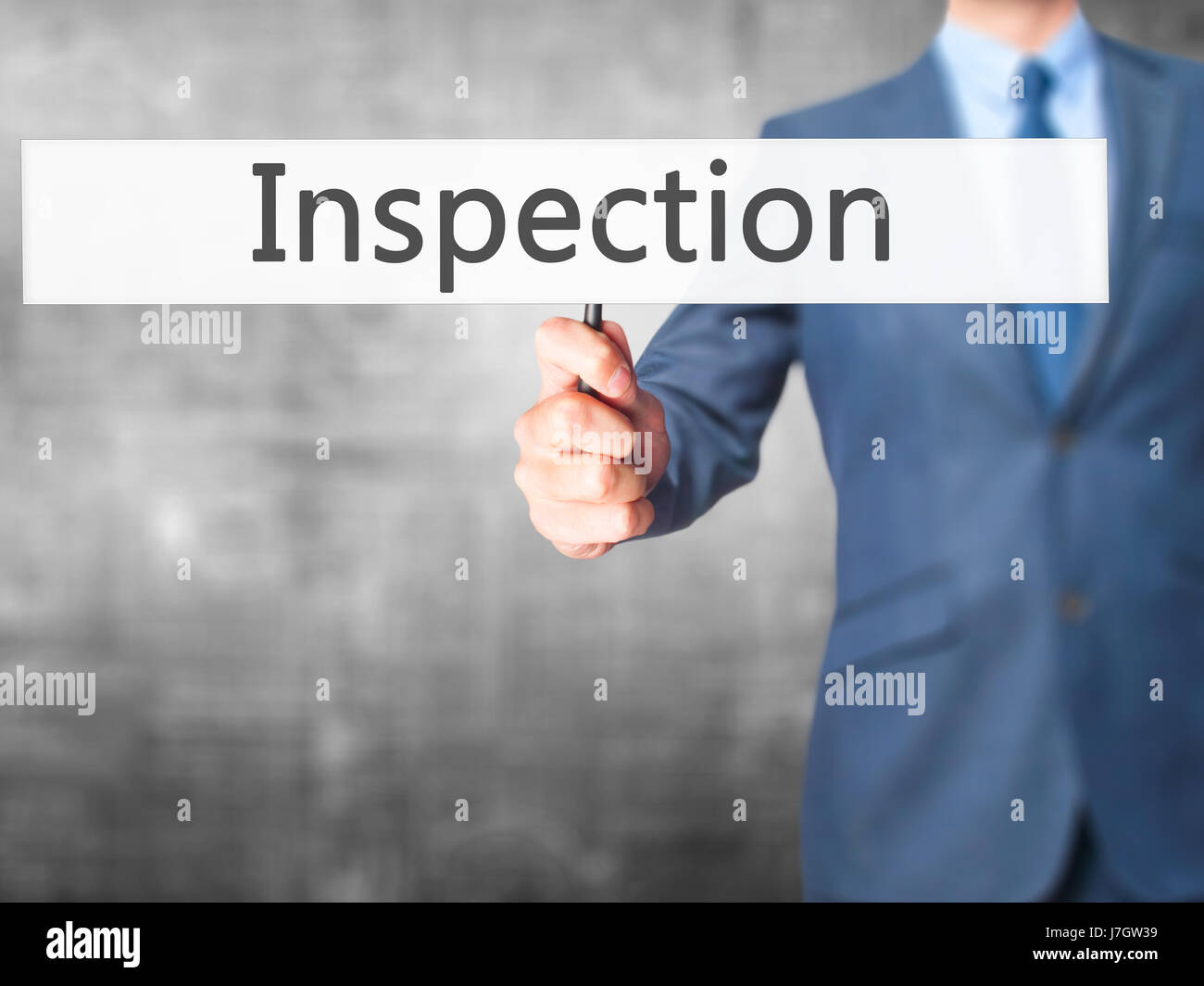 Inspection - Businessman hand holding sign. Business, technology ...