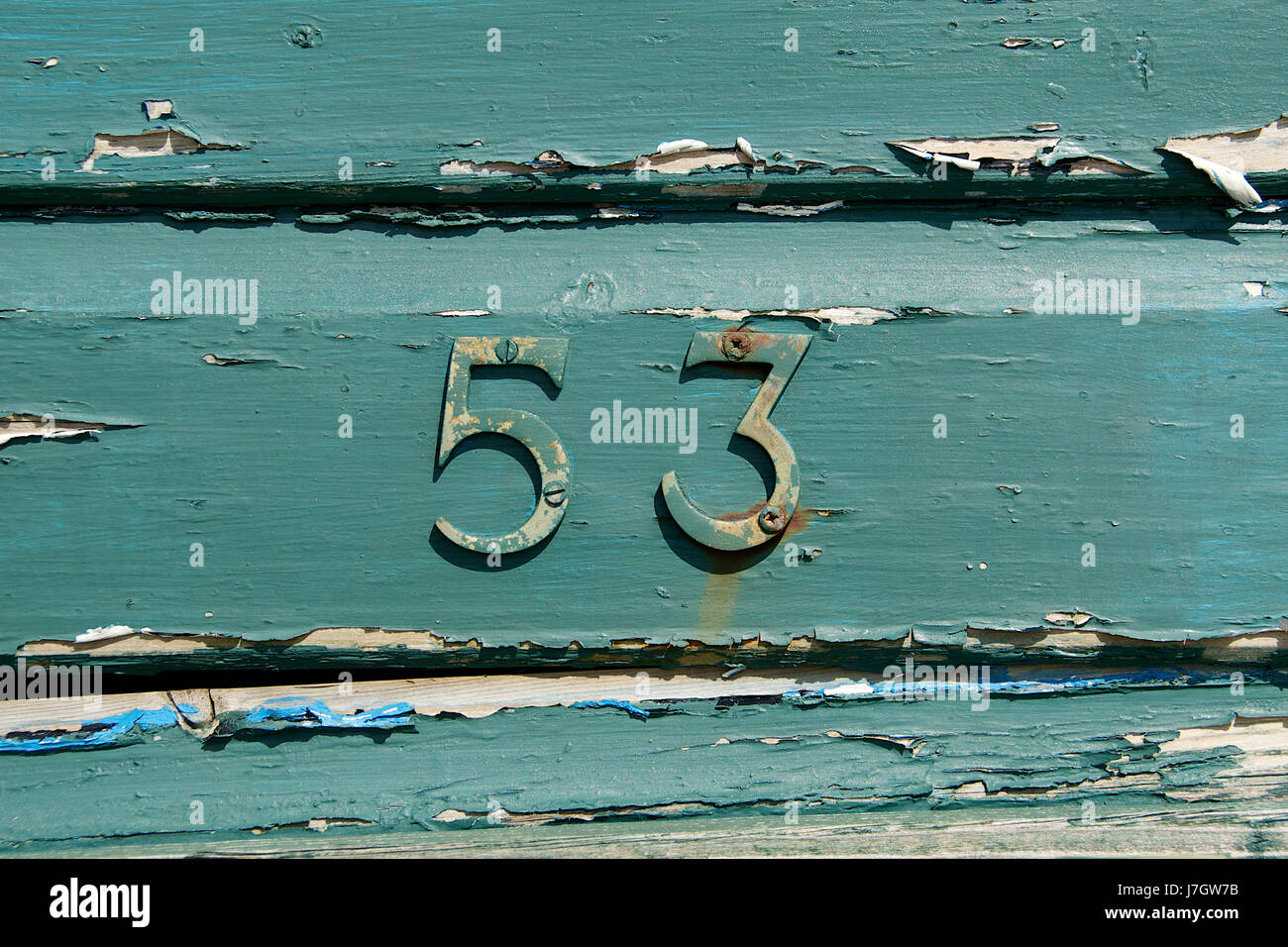 The number 53 on a beach hut Stock Photo - Alamy