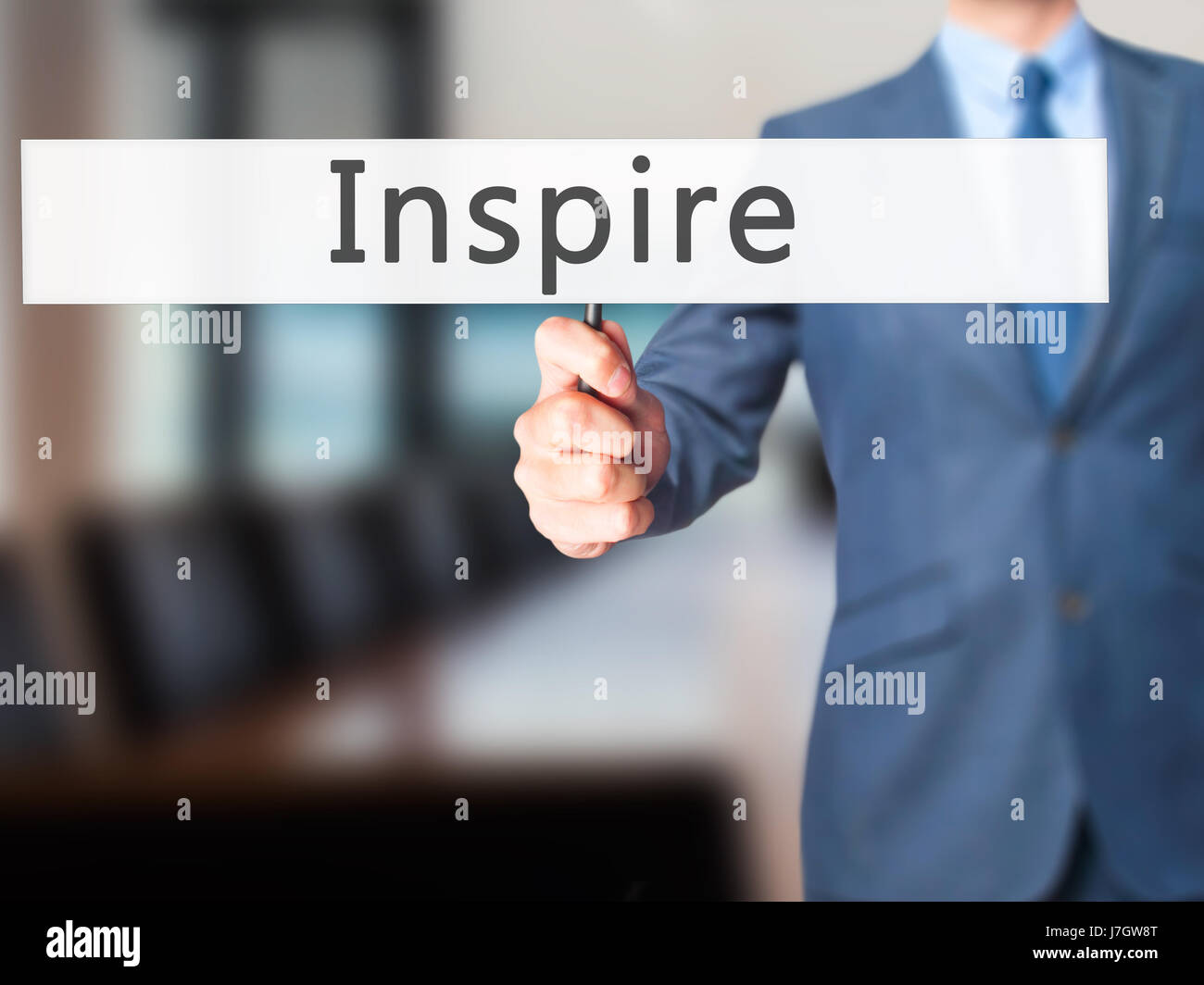 Inspire - Businessman hand holding sign. Business, technology, internet ...