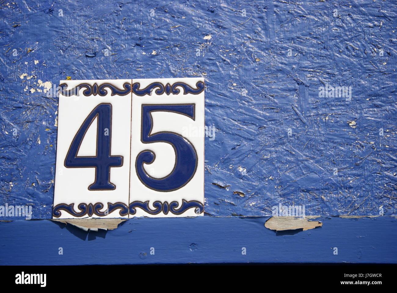 The number 45 on a beach hut Stock Photo - Alamy
