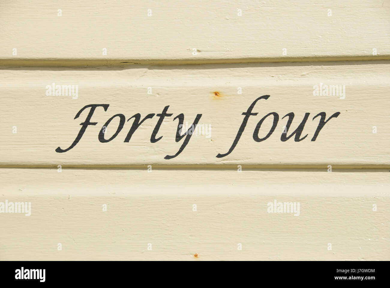 The number 44 on a beach hut Stock Photo - Alamy