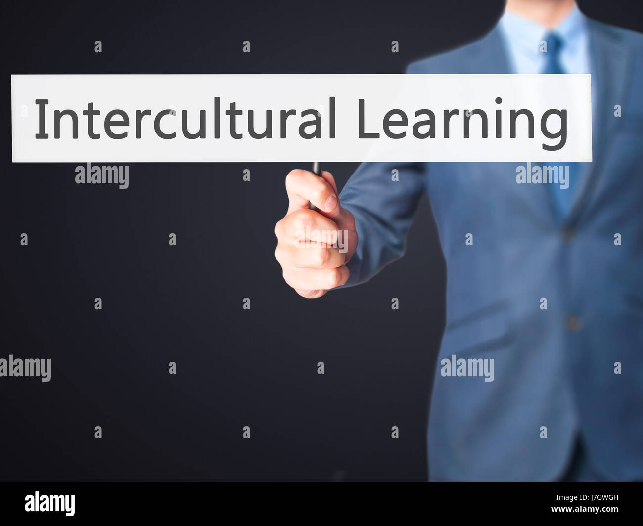 Intercultural Learning - Businessman hand holding sign. Business ...