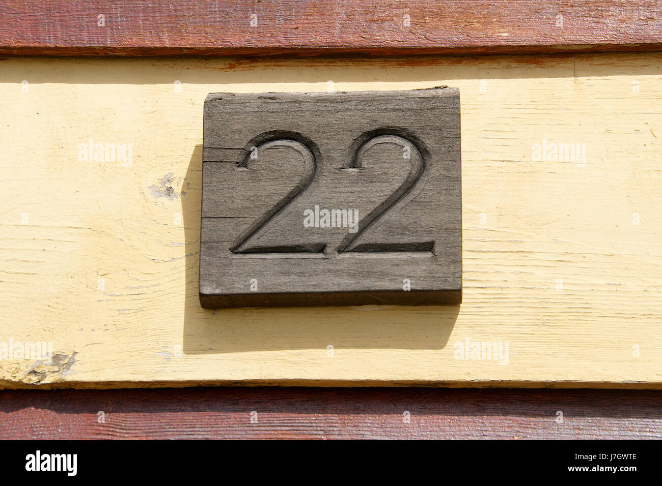 The number 22 on a beach hut Stock Photo - Alamy