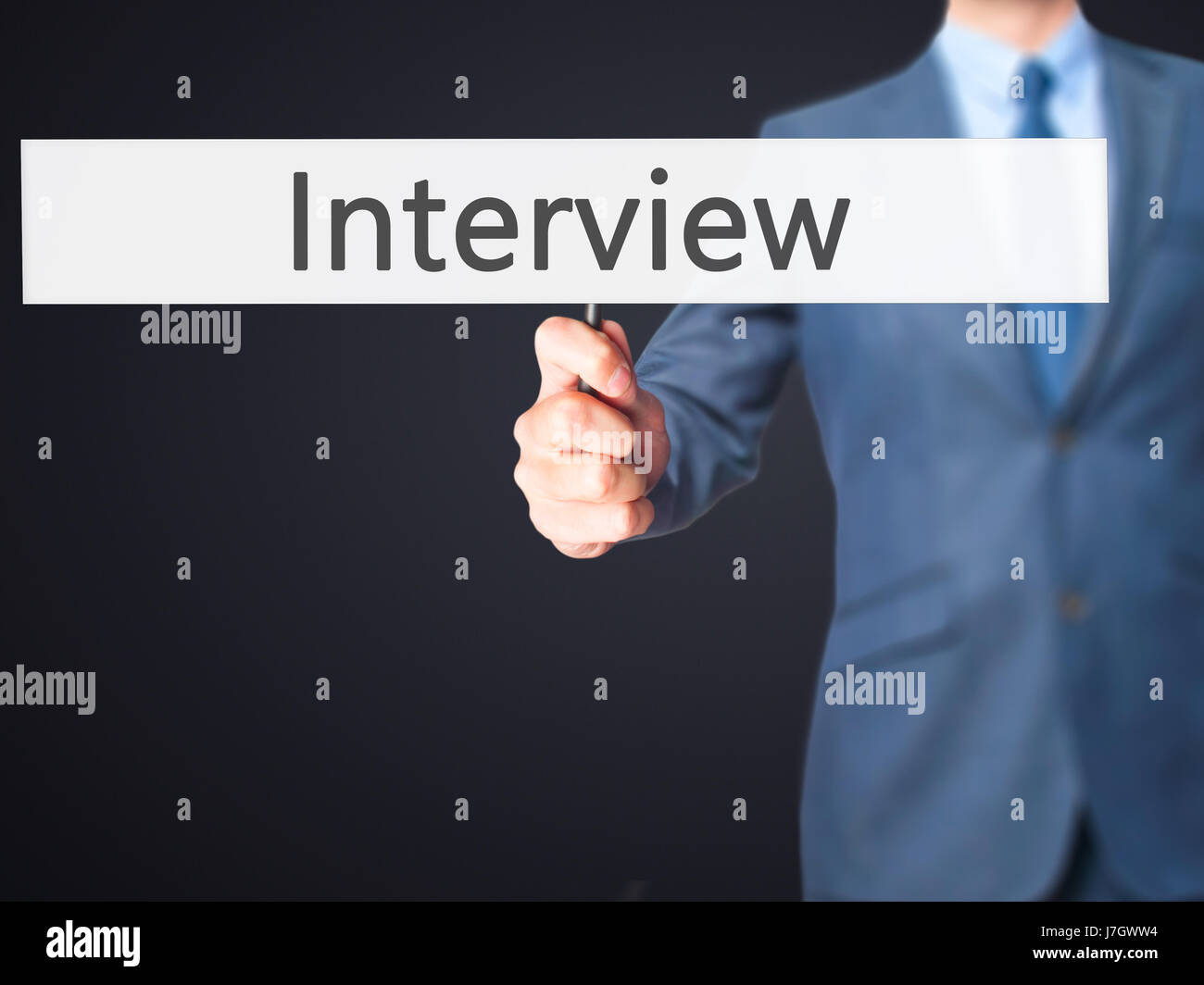 Interview - Businessman hand holding sign. Business, technology ...