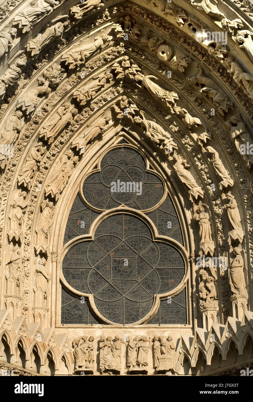 religious church stone statue window porthole dormer window pane ...