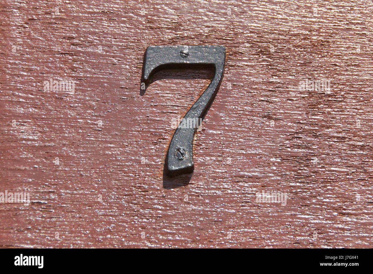 The number 7 on a beach hut Stock Photo - Alamy