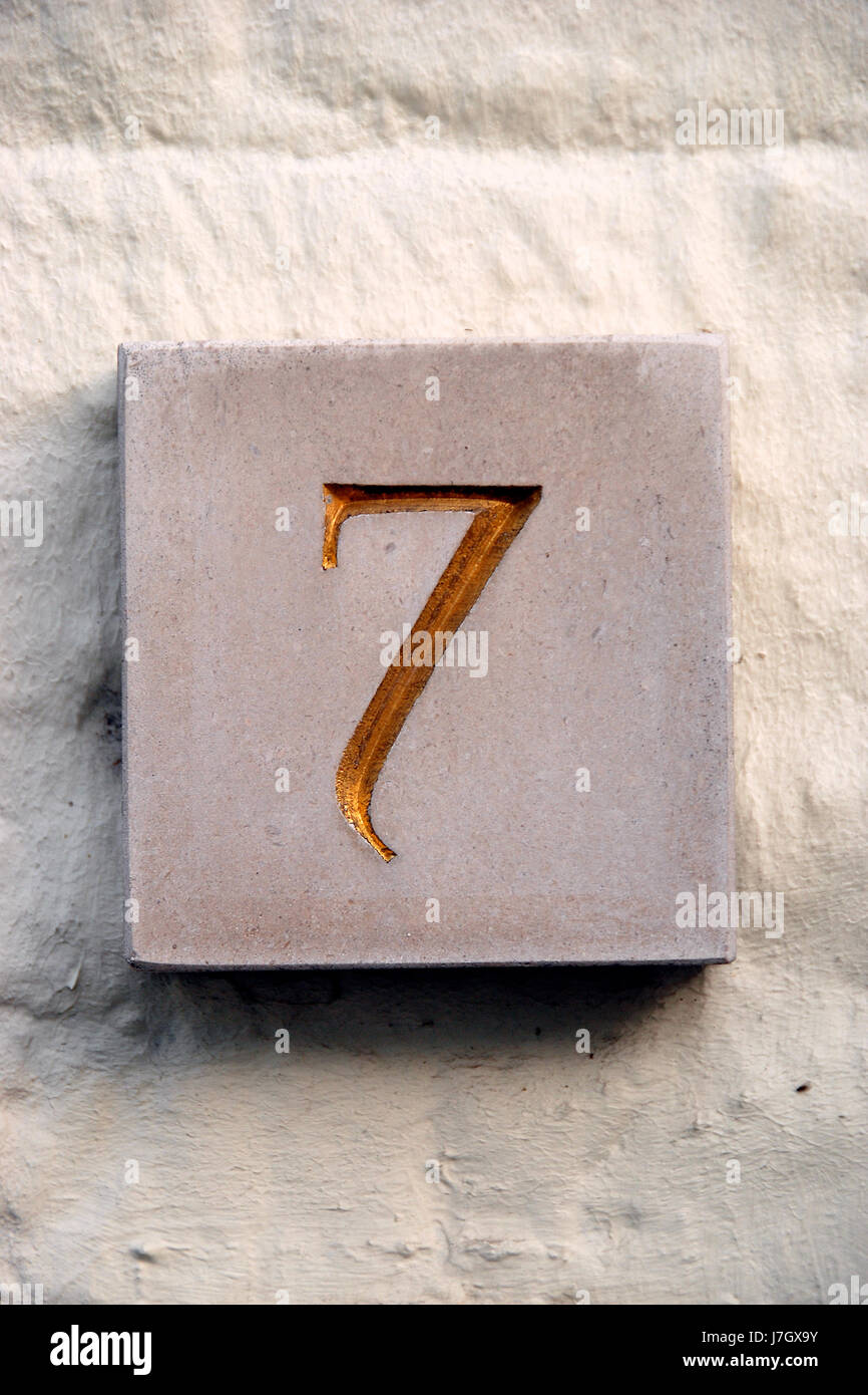The number 7 on a wall Stock Photo - Alamy