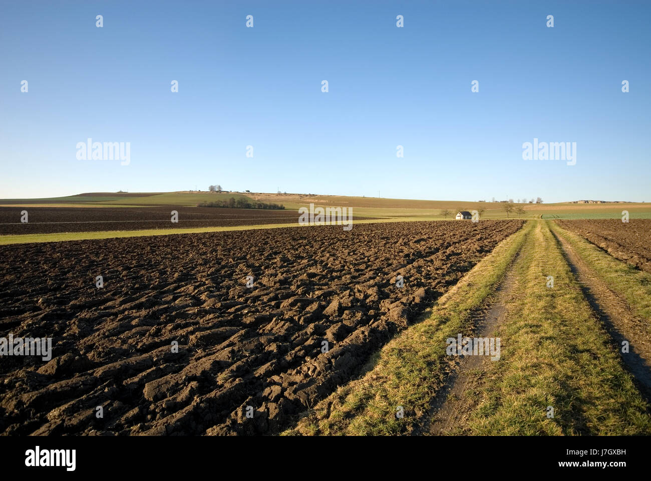 blue house building agrarian agricultural ground soil earth humus brown ...