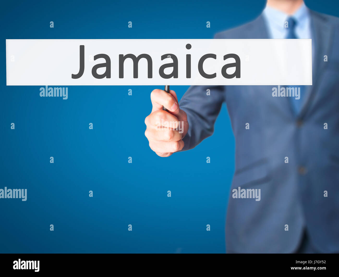 Jamaica - Businessman hand holding sign. Business, technology, internet ...