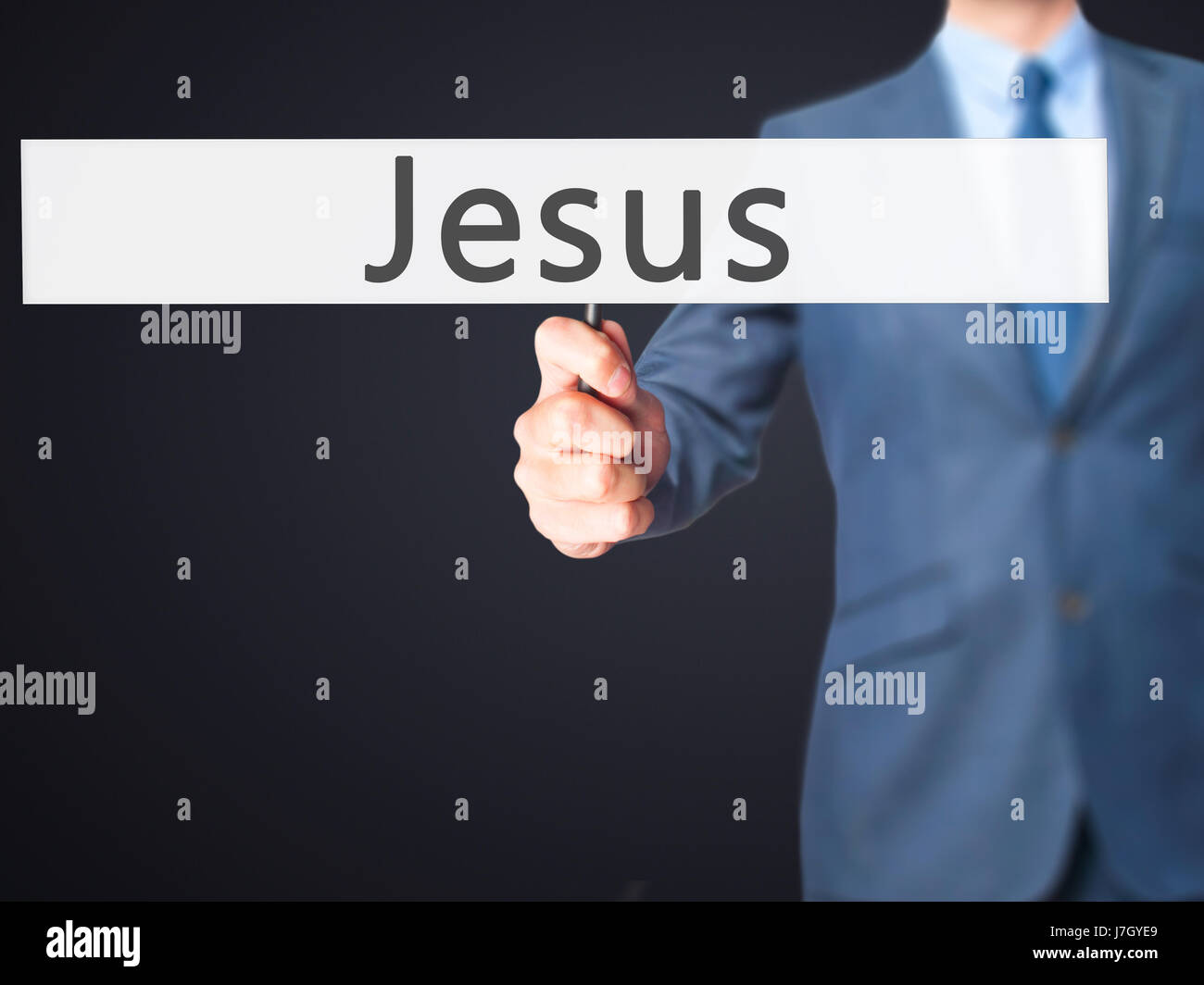 Jesus - Businessman hand holding sign. Business, technology, internet ...