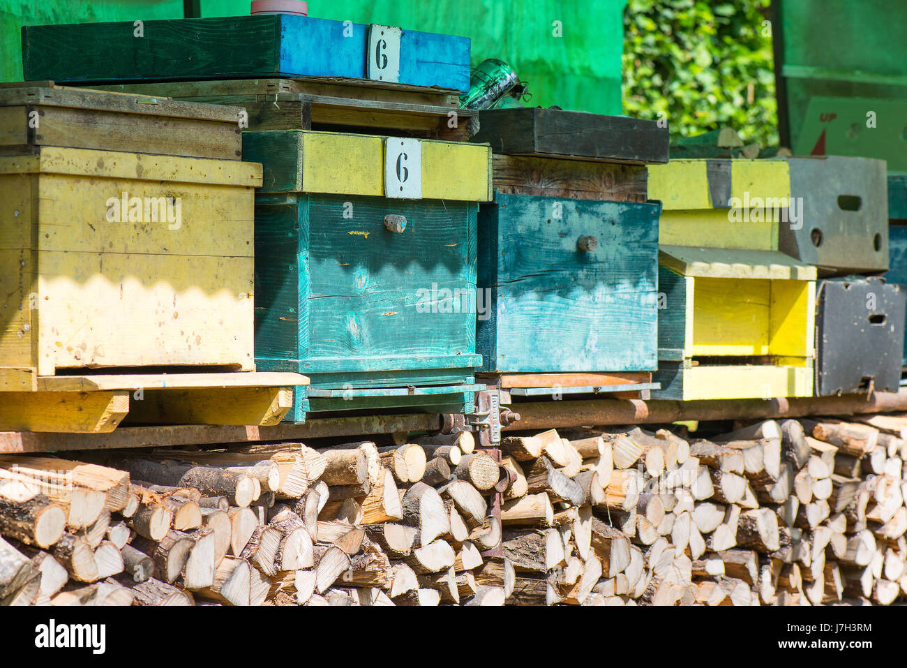 Huts for bees In small breeding in northern Italy Stock Photo - Alamy