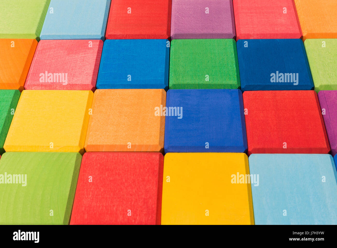 Colorful wooden bricks background Stock Photo - Alamy