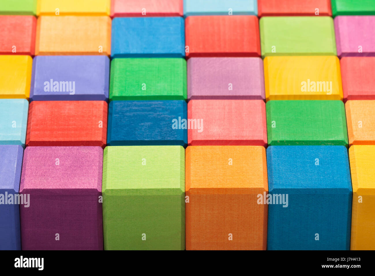 Colorful wooden bricks background Stock Photo - Alamy