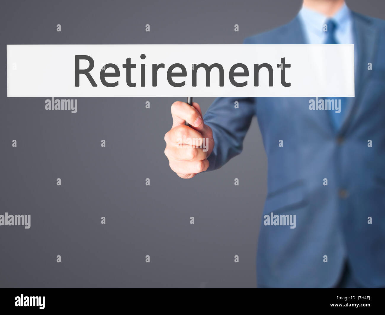 Retirement - Businessman hand holding sign. Business, technology ...