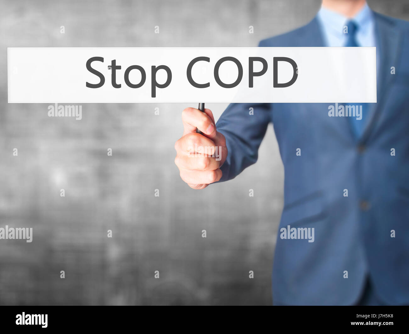 Stop COPD - Businessman hand holding sign. Business, technology ...