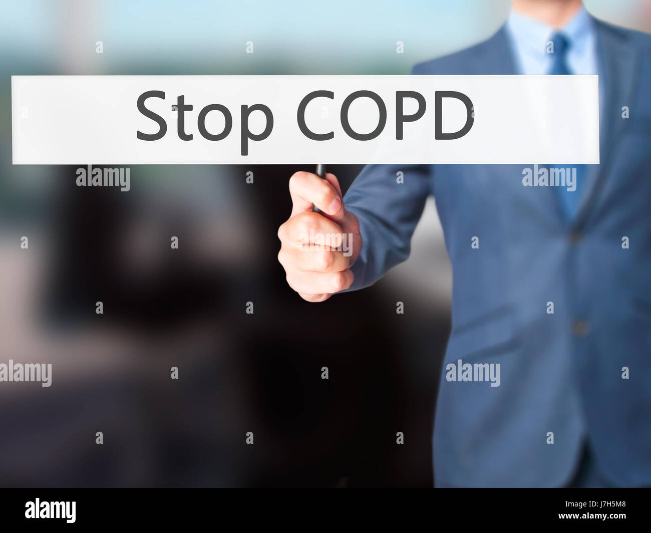 Stop COPD - Businessman hand holding sign. Business, technology ...