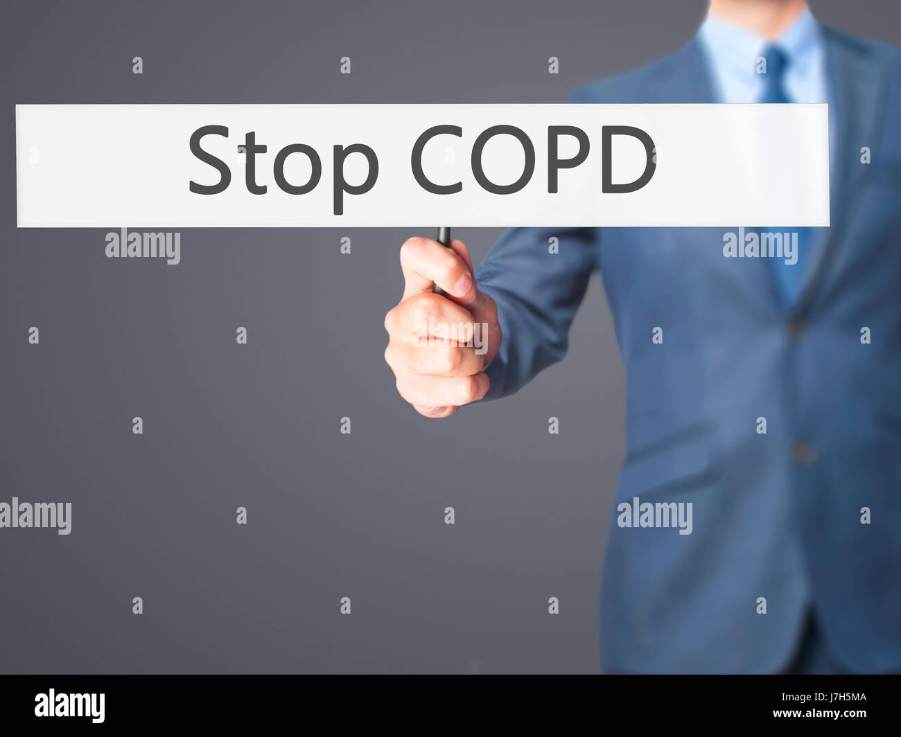 Stop COPD - Businessman hand holding sign. Business, technology ...