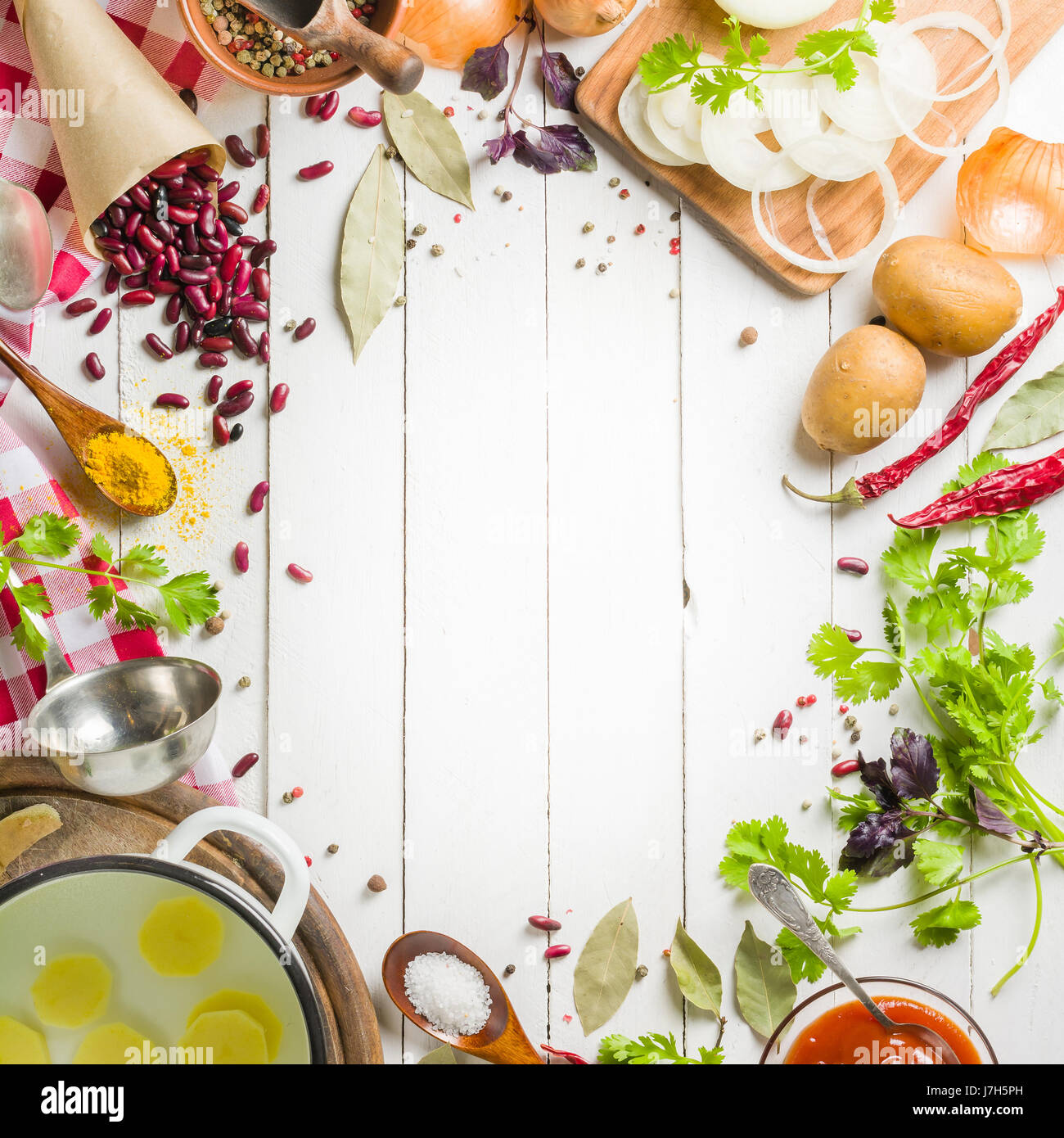 Preparation of soup at home. Rustic white background with vegetables ...