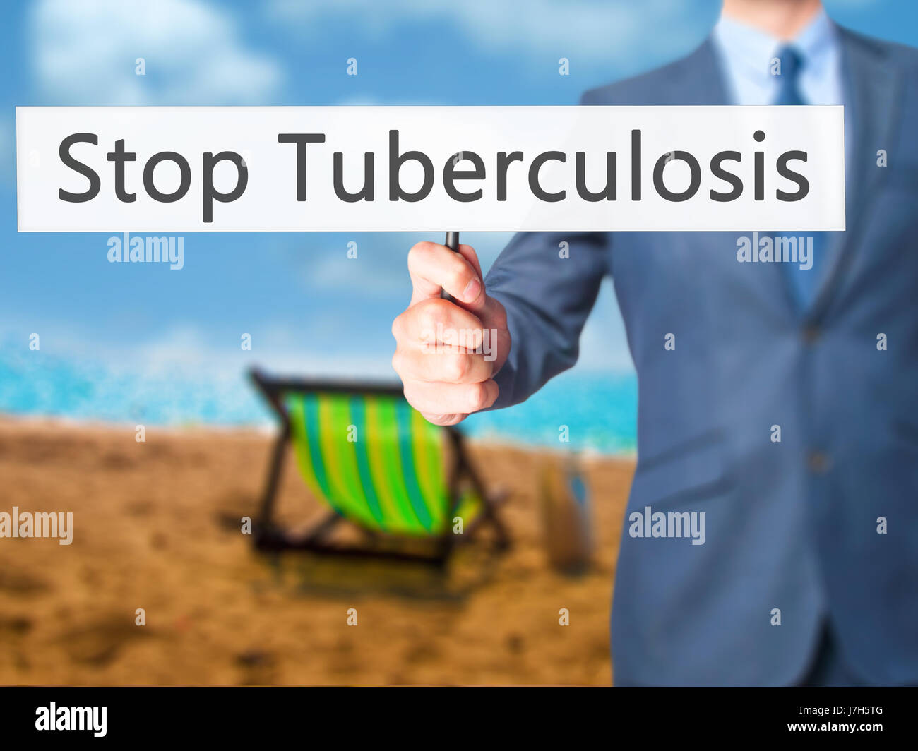 Stop Tuberculosis - Businessman hand holding sign. Business, technology ...