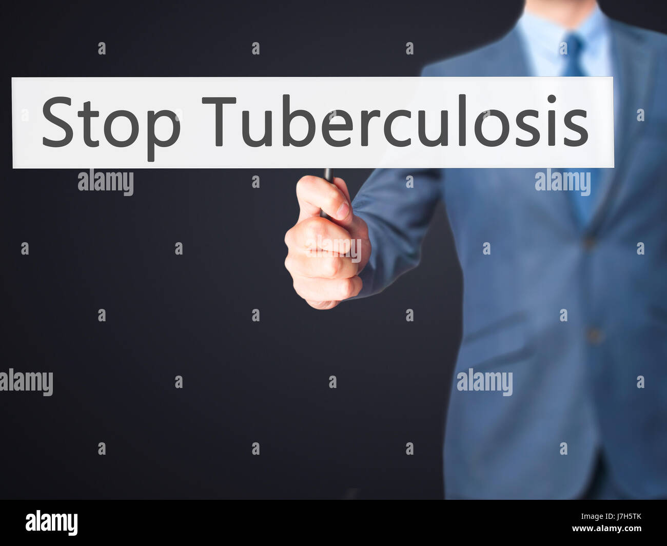 Stop Tuberculosis - Businessman hand holding sign. Business, technology ...