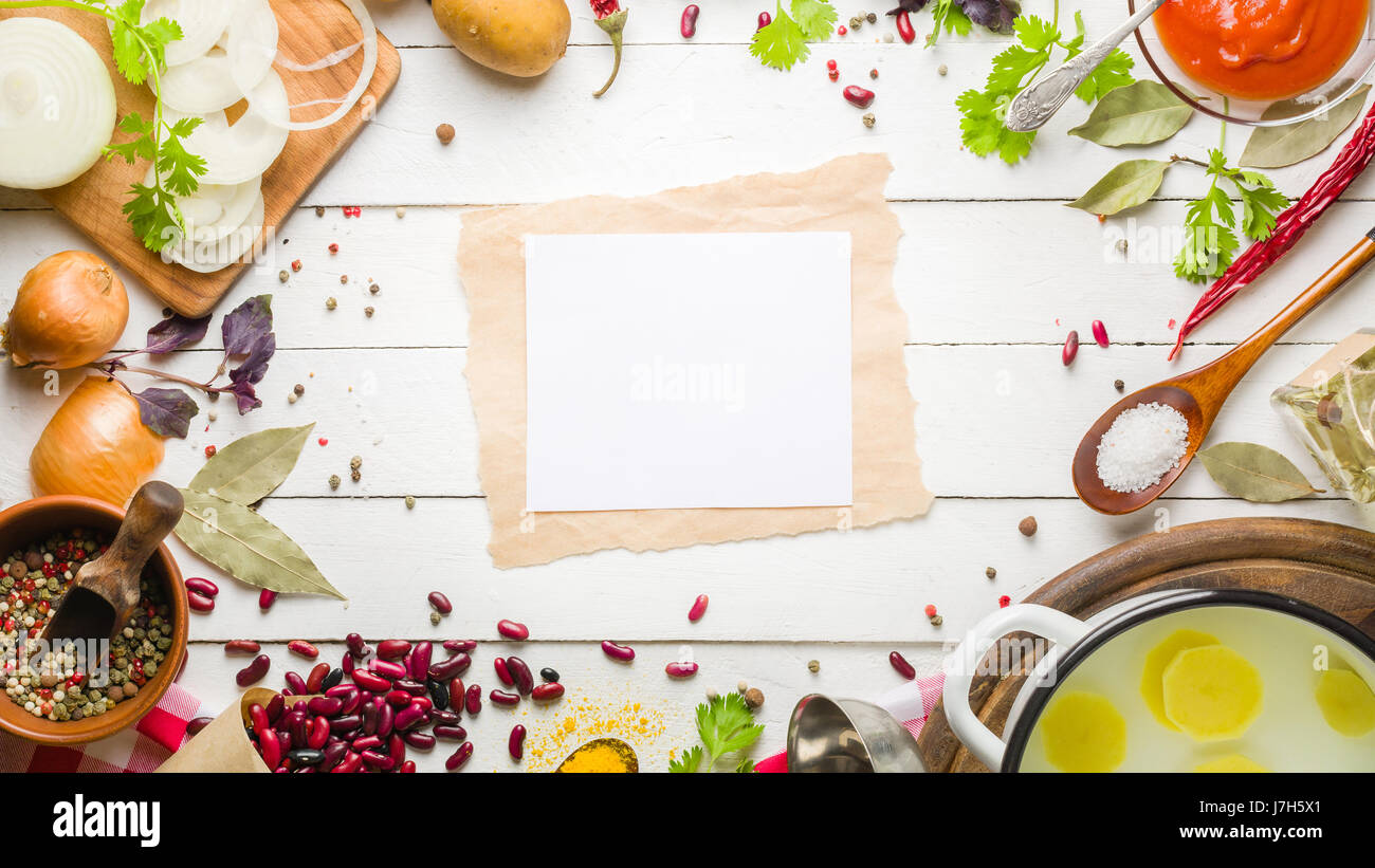 Preparation of soup at home. Rustic white background with vegetables ...