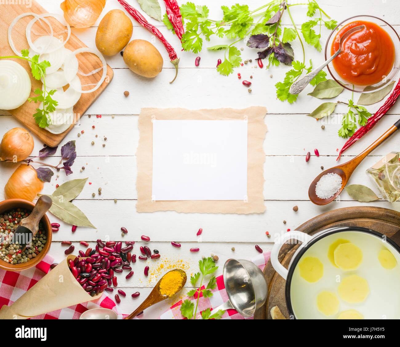 Preparation of soup at home. Rustic white background with vegetables ...