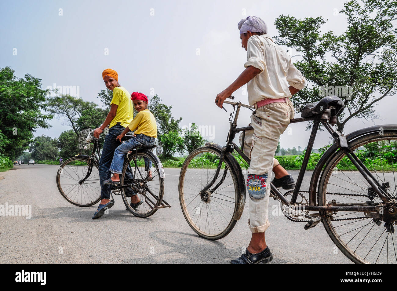 Indian boys on bicycle hi-res stock photography and images - Alamy