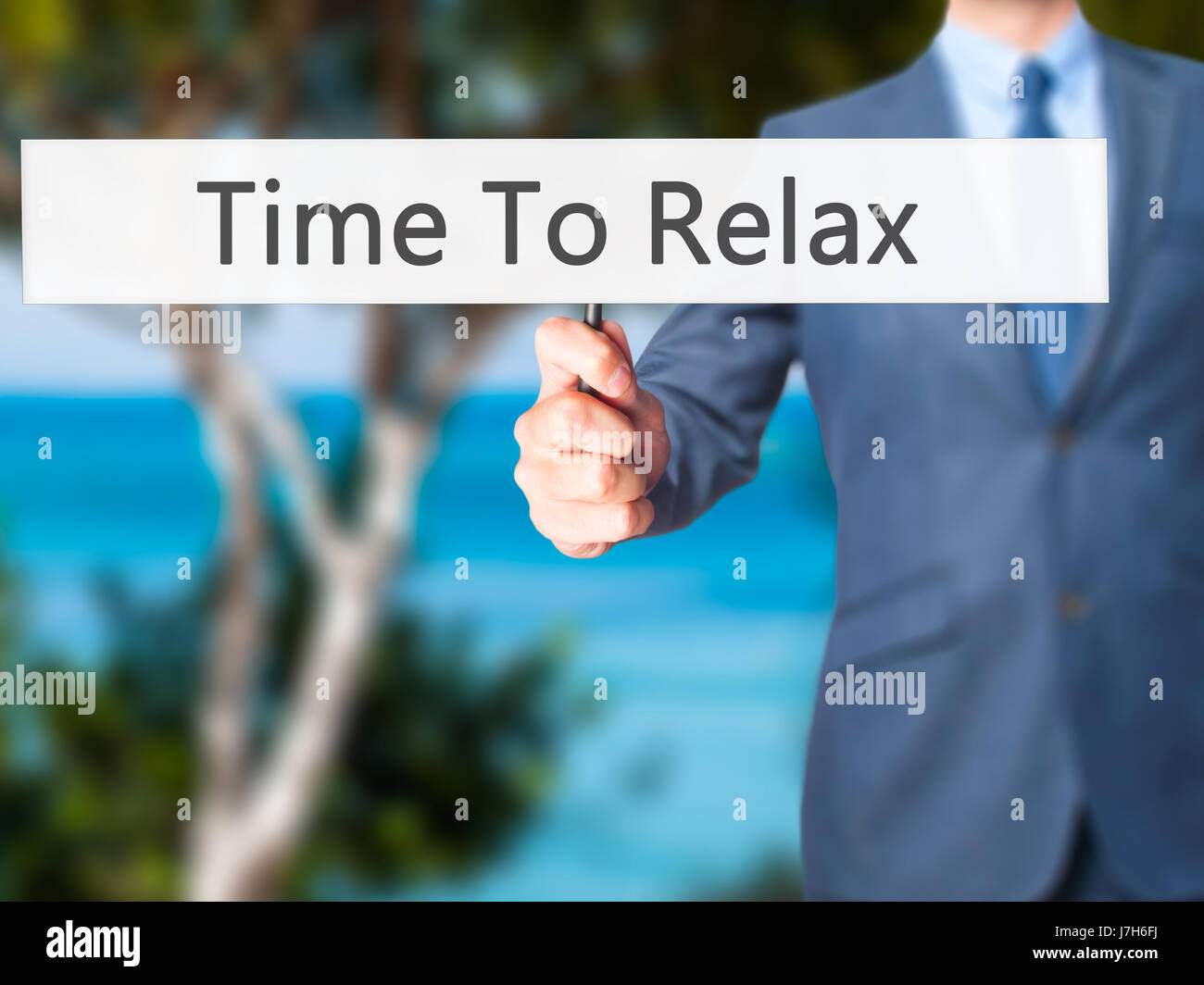 Time To Relax - Businessman hand holding sign. Business, technology ...