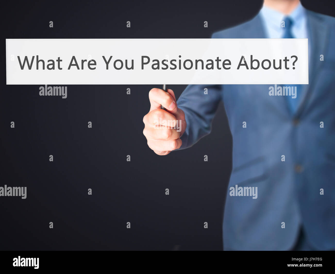 What Are You Passionate About? - Businessman hand holding sign ...