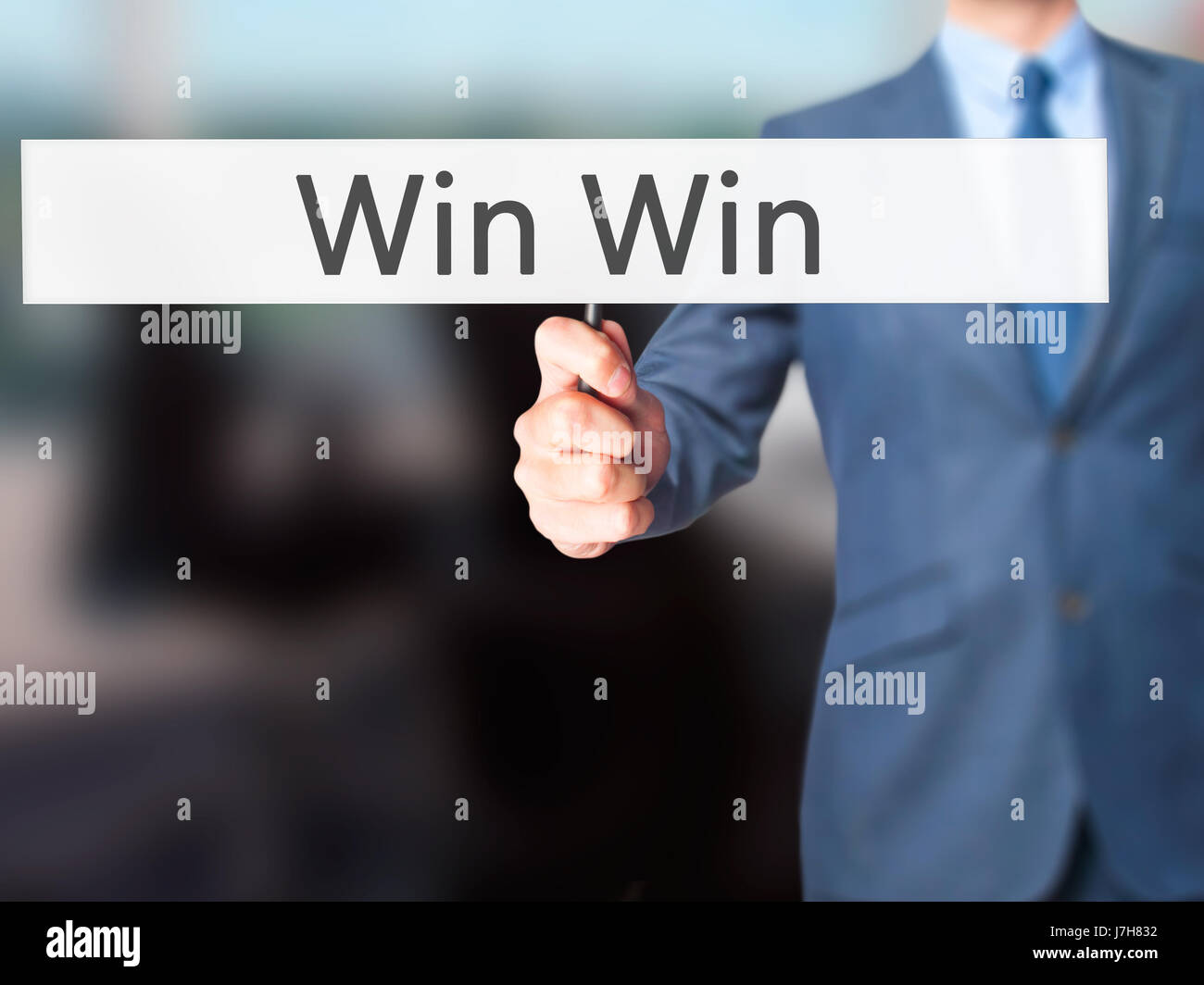 Win Win - Businessman hand holding sign. Business, technology, internet ...