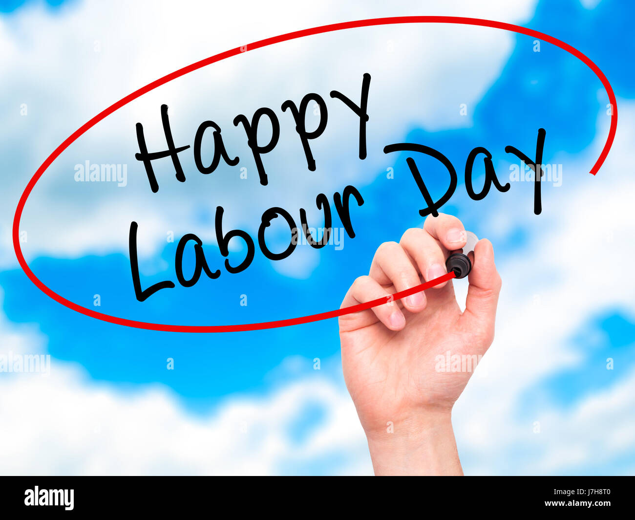 Man Hand writing Happy Labor Day with black marker on visual screen ...