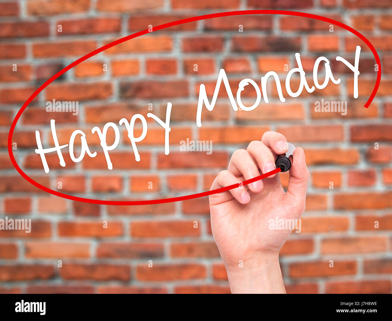 Man Hand writing Happy Monday with black marker on visual screen ...