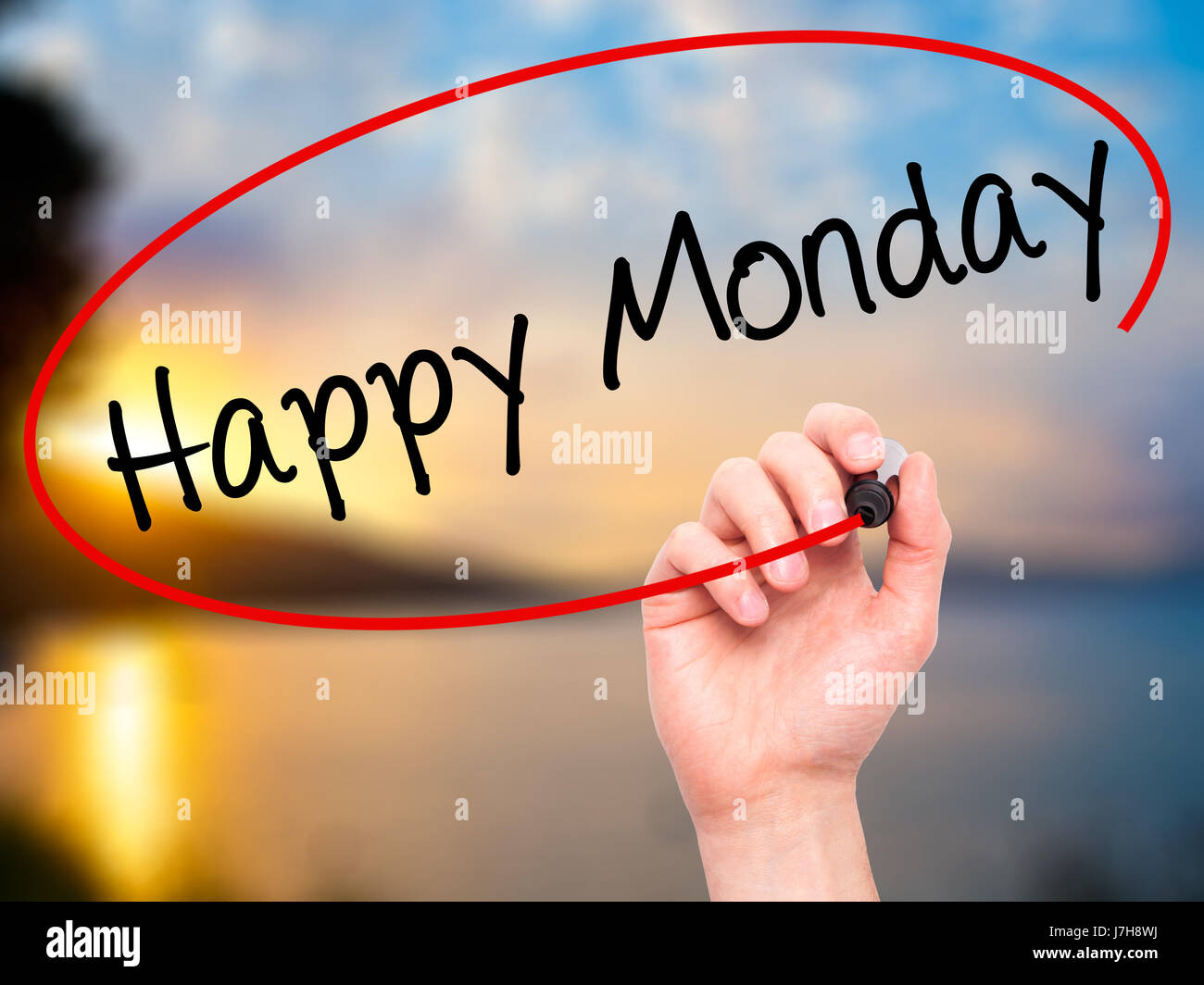 Man Hand writing Happy Monday with black marker on visual screen ...