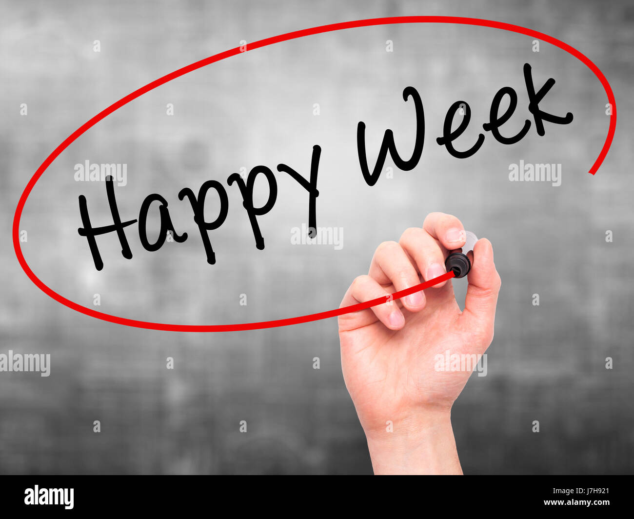 Man Hand writing Happy Week with black marker on visual screen ...