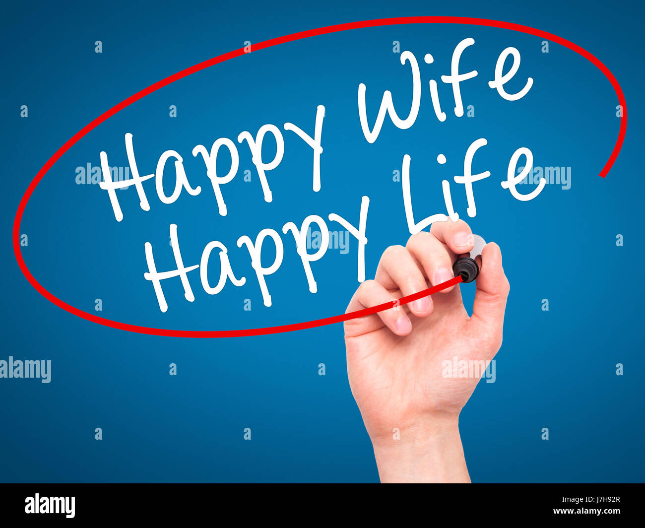 Man Hand writing Happy Wife Happy Life with black marker on visual ...