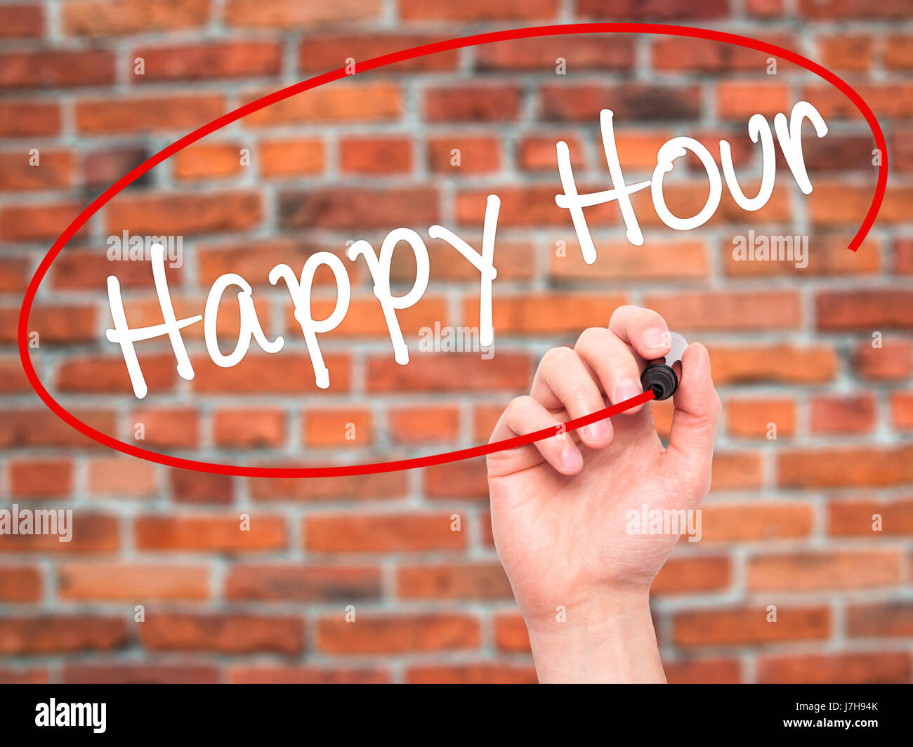 Man Hand writing Happy Hour with black marker on visual screen ...