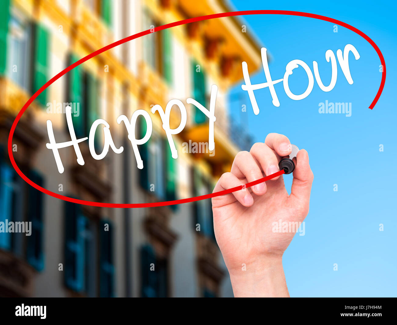 Man Hand writing Happy Hour with black marker on visual screen ...